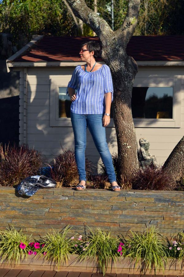 A new blue floaty blouse and silver & blue sandals Suzy Turner